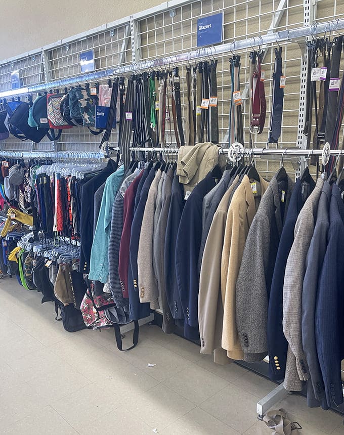 Men's suits and casual wear hang with dignity, patiently waiting for their second chance to make a first impression.