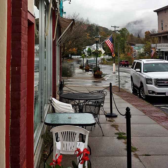 Even on a drizzly Vermont day, these sidewalk seats offer a front-row view of Bristol's Main Street life &ndash; small-town America at its most genuine.