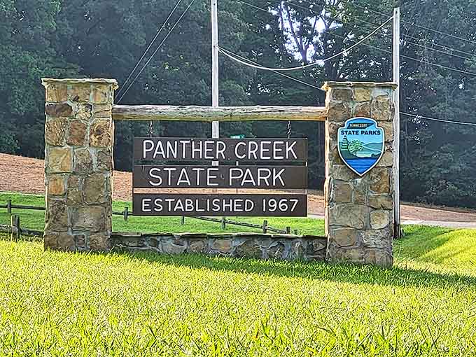 The entrance sign promising adventures since 1967. Like a good host, it doesn't just tell you where you are—it welcomes you home.