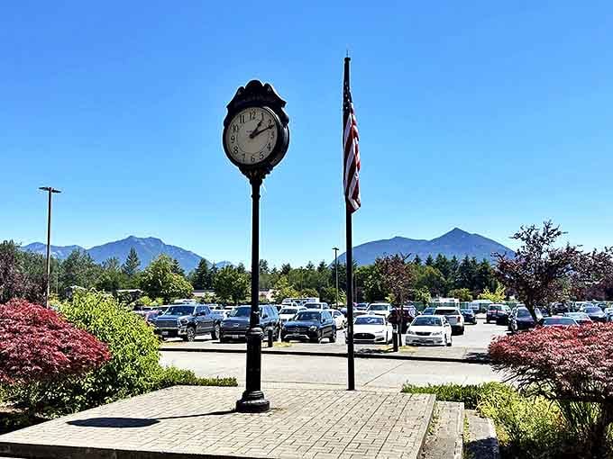 The parking lot view reveals Mount Si standing guard over shoppers' vehicles, nature's reminder that some things outvalue retail therapy.
