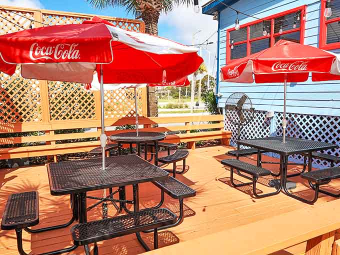 The outdoor patio offers al fresco dining under Coca-Cola umbrellas &ndash; because seafood somehow tastes even better with a Gulf breeze.