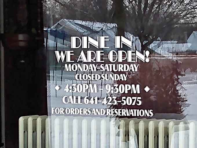 The hours posted on the door &ndash; a schedule worth planning your week around if you're serious about experiencing steak perfection.