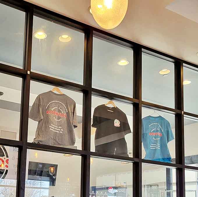 Even the merchandise tells a story &ndash; t-shirts displayed like trophies, proudly proclaiming allegiance to proper deli culture in vacation country.