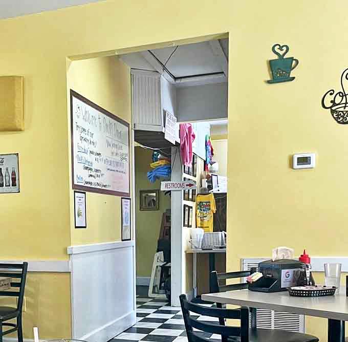 The pathway to the restrooms reveals the behind-the-scenes charm of a place that's about substance over style.