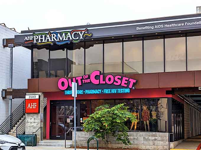 Out of the Closet's vibrant pink signage pops against the urban landscape &ndash; as bold as the dual mission of retail and healthcare.