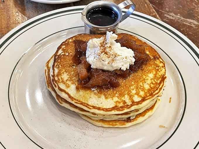 Pancakes topped with apple compote and whipped cream &ndash; autumn's greatest hits album served on a plate instead of vinyl.