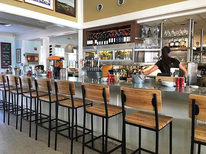 The bar where seafood stories are shared and local brews flow. Wood, metal, and the promise of good drinks&mdash;what more could you want?