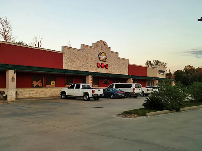 BubbaQue's bold red exterior promises what every BBQ joint should: slow-cooked perfection that makes you forget you're eating in a strip mall.