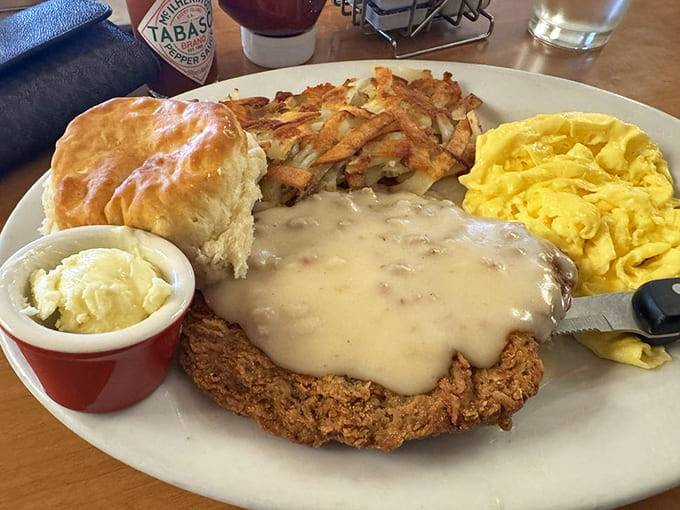 Country-fried steak swimming in gravy isn't just comfort food—it's therapy on a plate, no appointment necessary.