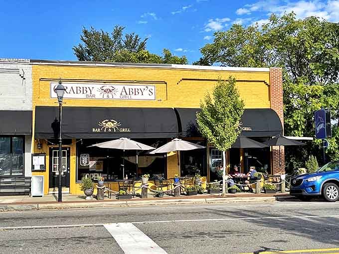 Crabby Abby's sunny yellow facade and inviting patio create the perfect backdrop for that universal vacation pleasure&mdash;a leisurely lunch with zero agenda.