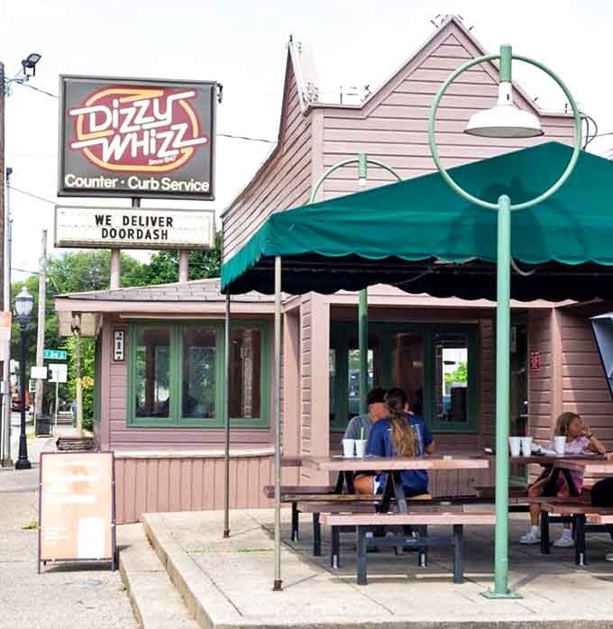 The outdoor dining area&mdash;where strangers become neighbors over shared appreciation of perfectly grilled patties and Louisville's gentle breezes.