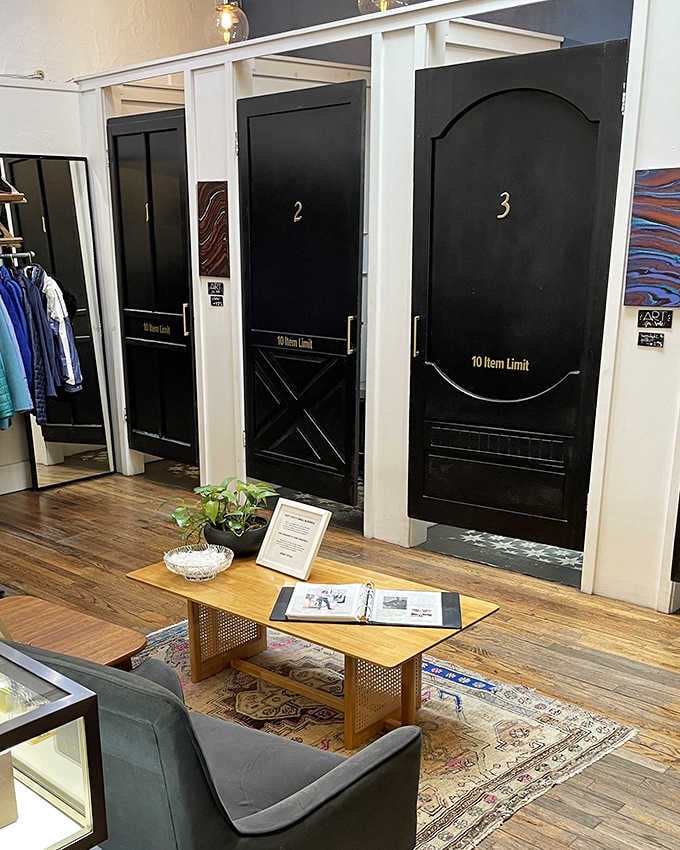 Fitting rooms numbered like chapters in your style story&mdash;where the "10 Item Limit" sign is both a challenge and an invitation to curate carefully.