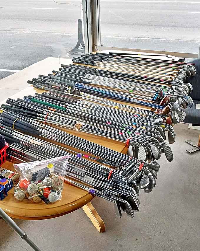 Golf club forest by the window &ndash; where weekend warriors' abandoned dreams await resurrection. That nine-iron might just fix your slice!