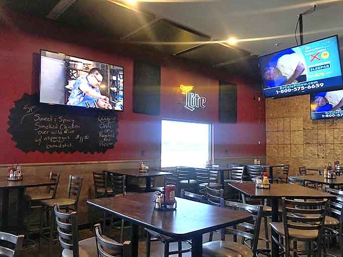 The dining area balances sports bar energy with family restaurant comfort&mdash;where the glow of screens is matched only by the warmth of conversation.