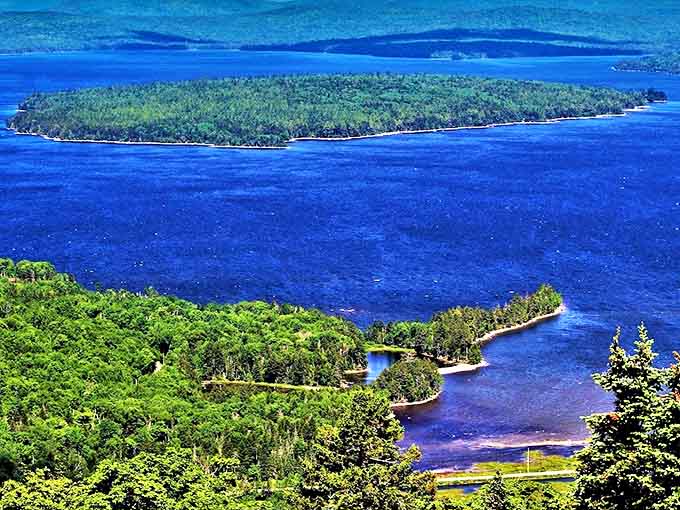 Mooselookmeguntic Lake spreads out like a sapphire among emeralds&mdash;a name as magnificent as the view it commands.