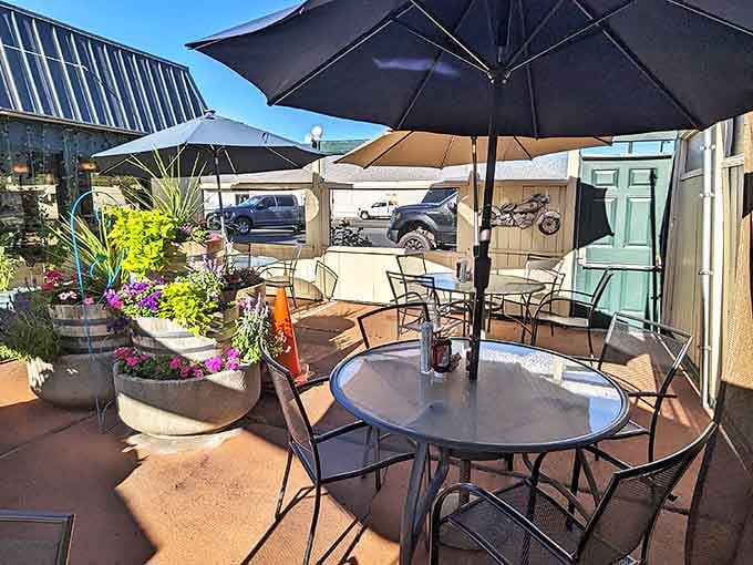 The outdoor patio offers fresh air dining under umbrellas, where every meal comes with a side of Nevada sunshine.