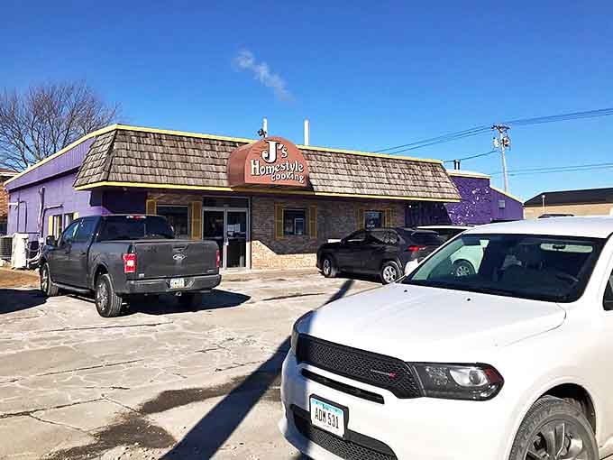 A parking lot filled with trucks and SUVs—the universal sign of "good food inside." In Iowa, vehicle density equals culinary credibility.