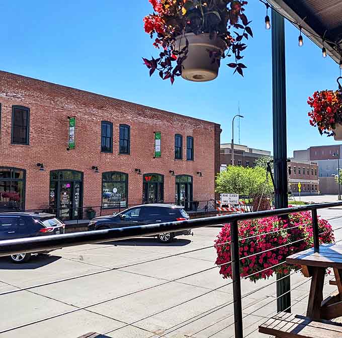 Downtown Sioux Falls provides the perfect setting for this culinary gem, where hanging flowers add pops of color to the historic streetscape.