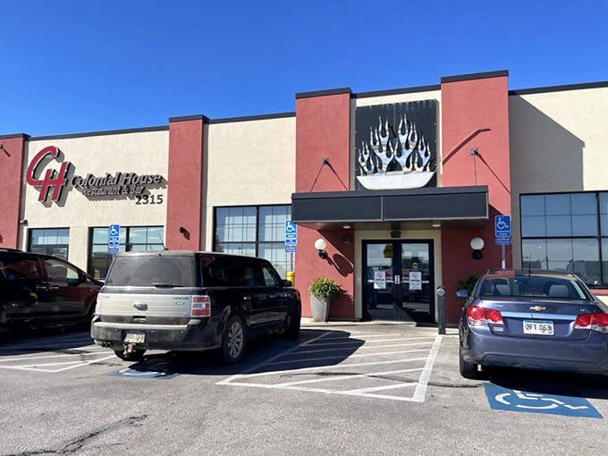 The Colonial House's distinctive flame logo promises what every hungry traveler seeks &ndash; food worth pulling over for.