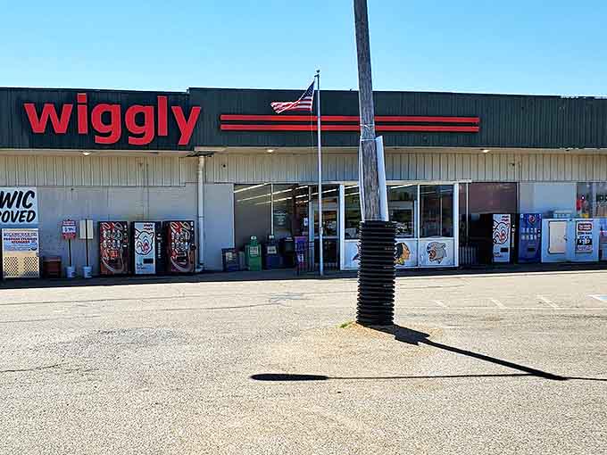 The Piggly Wiggly stands as a cultural touchstone where shopping carts still roll straight and cashiers remember your name.