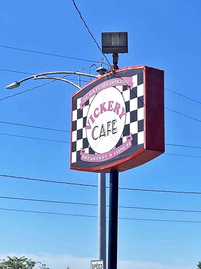 The checkered sign stands like a beacon of hope for the hungry, promising scratch cooking that your grandmother would approve of.
