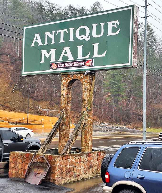 The green Antique Mall sign with "The 50's Diner" beneath it &ndash; a two-for-one nostalgia experience that promises to feed both your soul and your stomach.