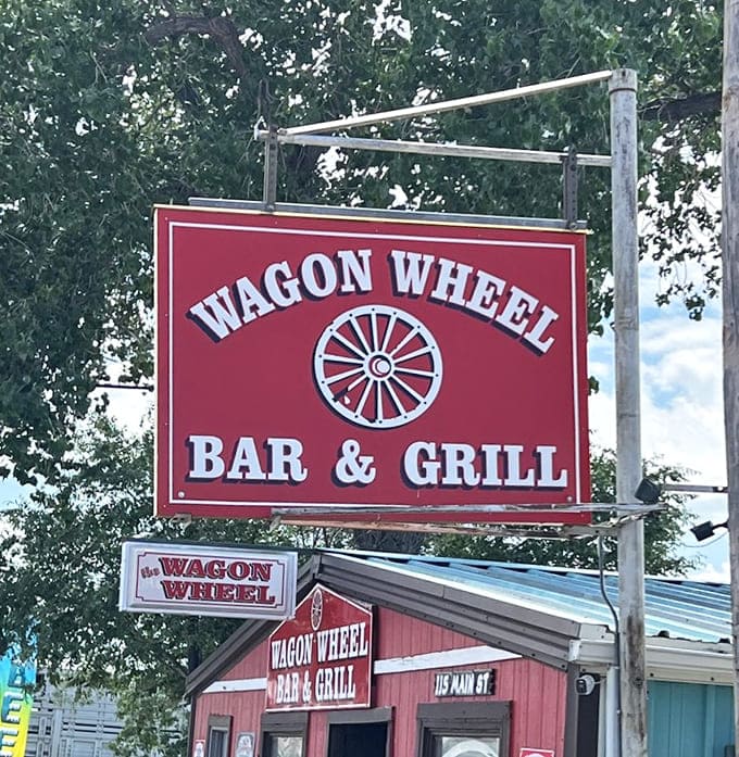 The sign that's guided hungry travelers for generations. Like a lighthouse for hamburger seekers, it promises satisfaction just ahead.
