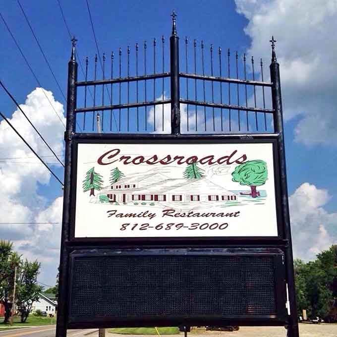The Crossroads sign stands as a beacon of hope for hungry travelers&mdash;like a lighthouse, but guiding you to gravy instead of safe harbor.