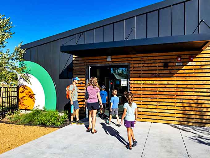 The Quiver's modern wooden facade invites families to discover archery in a space where Robin Hood would feel right at home&mdash;bullseyes optional but encouraged.