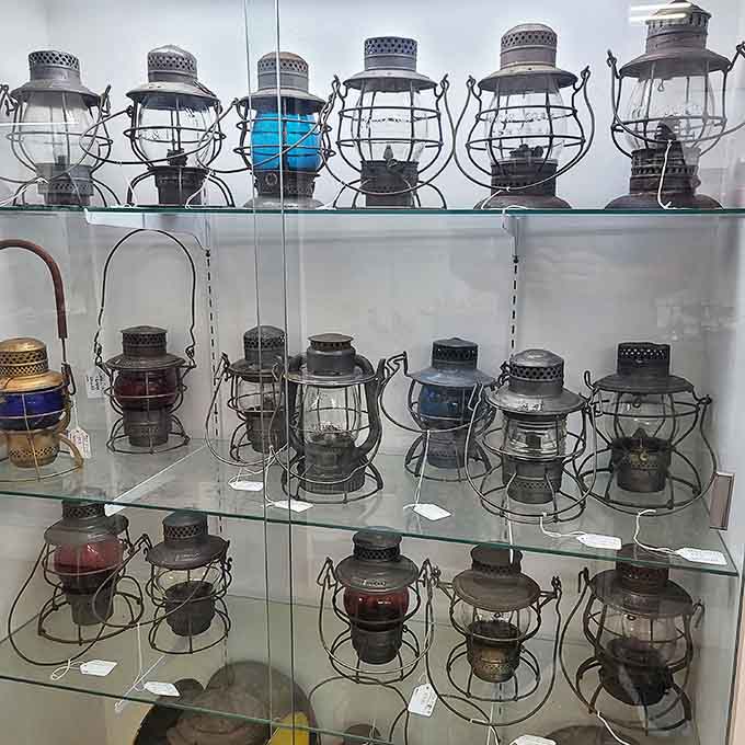 Railroad lanterns that once guided trains through midnight fog now illuminate collections with their storied glow.