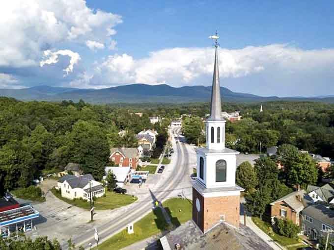 Church steeples still define Vermont skylines, pointing heavenward while the town below moves at its own perfectly unhurried pace.
