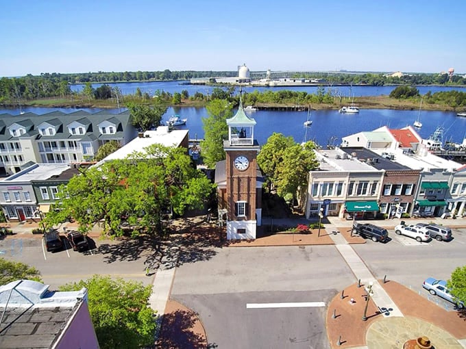 From above, Georgetown reveals its perfect positioning&mdash;historic clock tower anchoring the town while waterways embrace it from all sides like liquid streets.