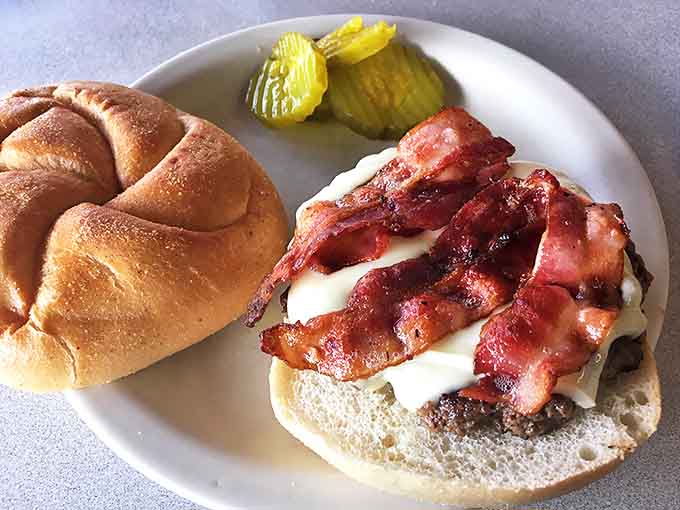 The bacon cheeseburger – America's greatest contribution to world peace. Those pickle chips are standing by to cut through the richness like old friends.