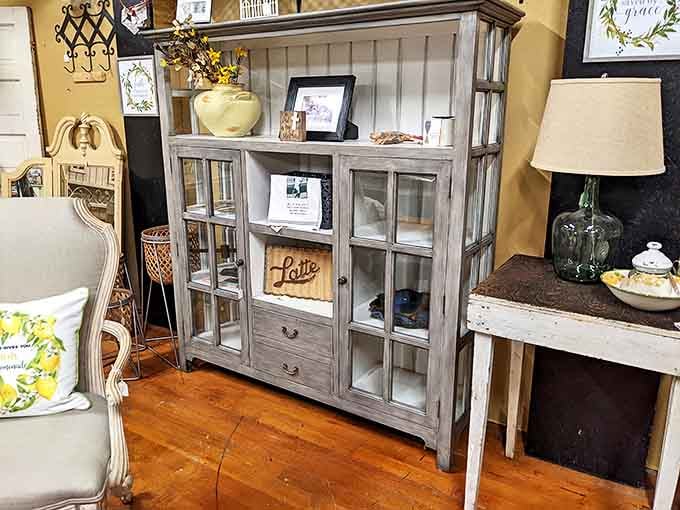 Farmhouse chic meets practical storage in this weathered cabinet—the perfect home for your grandmother's china or your vinyl collection.