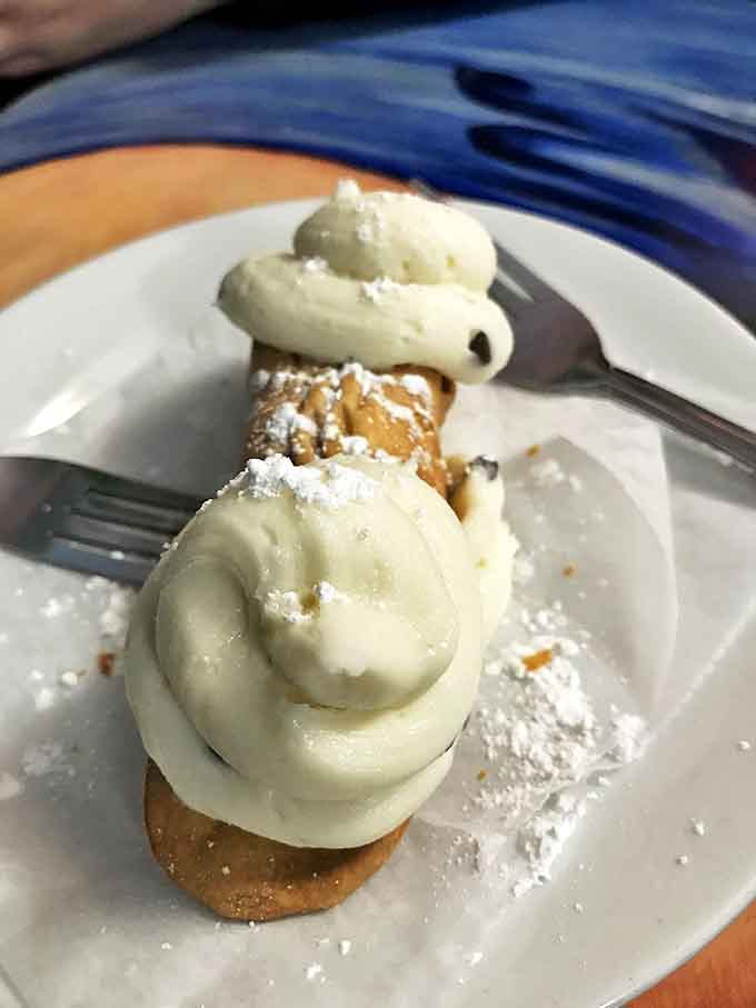 Cannoli that transport you straight to Sicily &ndash; crisp shells, creamy filling, and a dusting of powdered sugar that's worth every dry-cleaning bill.