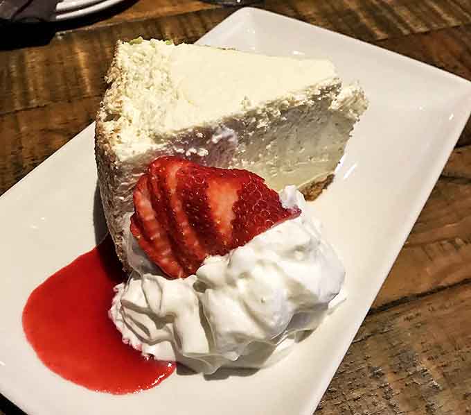 Cheesecake as it should be – dense, rich, and unapologetic about its mission to deliver pure, unfiltered joy straight to your pleasure receptors.