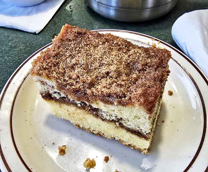 Coffee cake that makes you understand why people used to invite neighbors over specifically to eat cake with coffee. This isn't dessert—it's an institution.