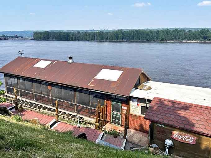 From this angle, the Fish Shack looks like it's about to slide right into the Mississippi&mdash;thankfully it's been holding strong for years, serving up riverside perfection.