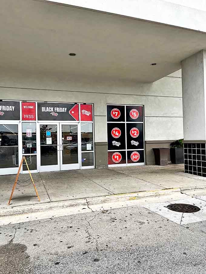 The entrance to bargain paradise, complete with daily deal signage. Those red circles with their tantalizing numbers lure shoppers like moths to a flame.