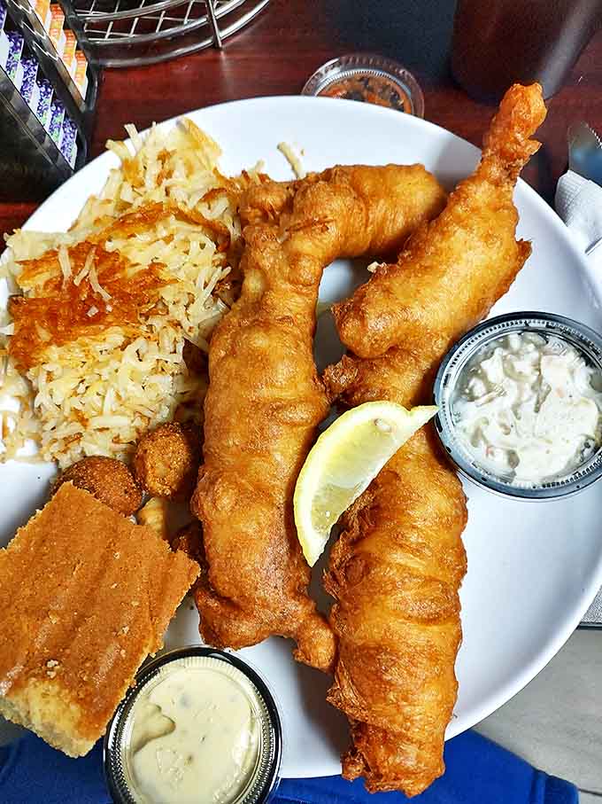Fish so perfectly golden-battered it makes you wonder if the chef has a degree in crispology. Served with the triumvirate of dipping sauces.