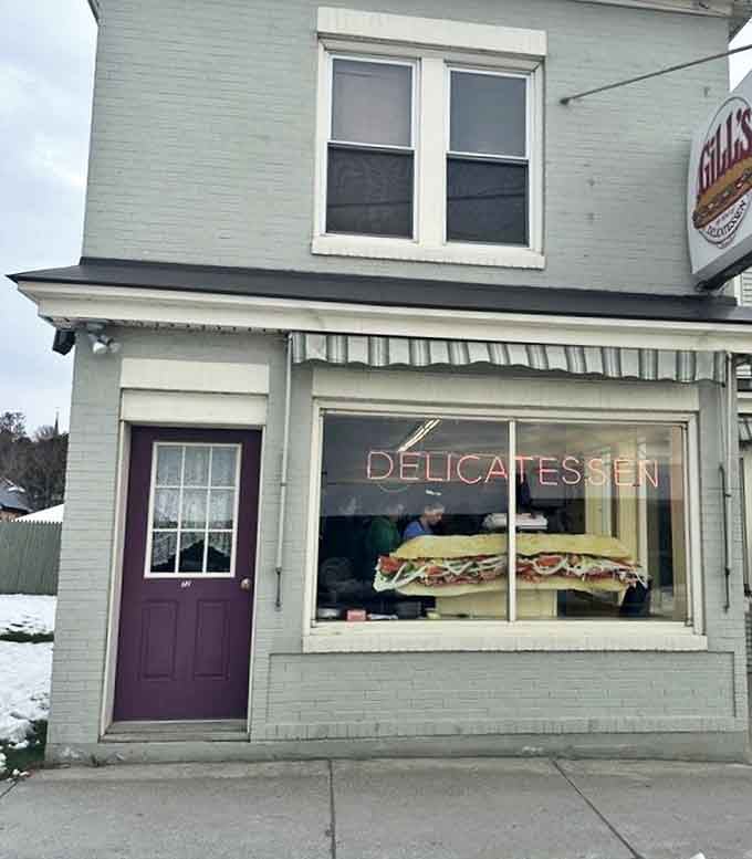 The sandwich silhouette in the window serves as Rutland's most honest advertising&mdash;what you see is exactly what you get.