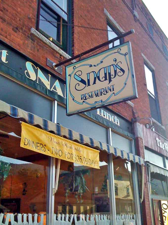 The iconic hanging sign for Snap's Restaurant promises simple pleasures and honest value &ndash; a beacon for hungry travelers and loyal locals alike.