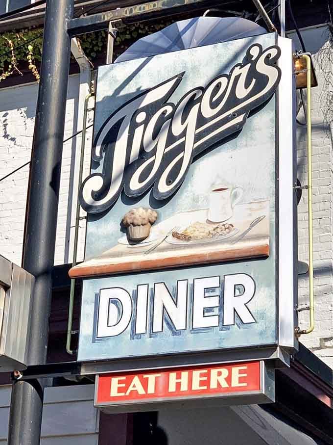 The sign says "EAT HERE" and honestly, that might be the best advice you'll get all day