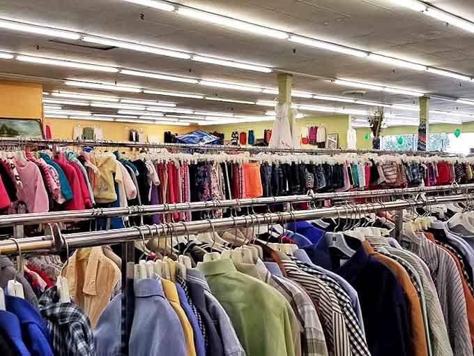 The menswear section: where button-downs and blazers hang patiently, waiting for someone to give them purpose beyond "casual Friday" at the office.