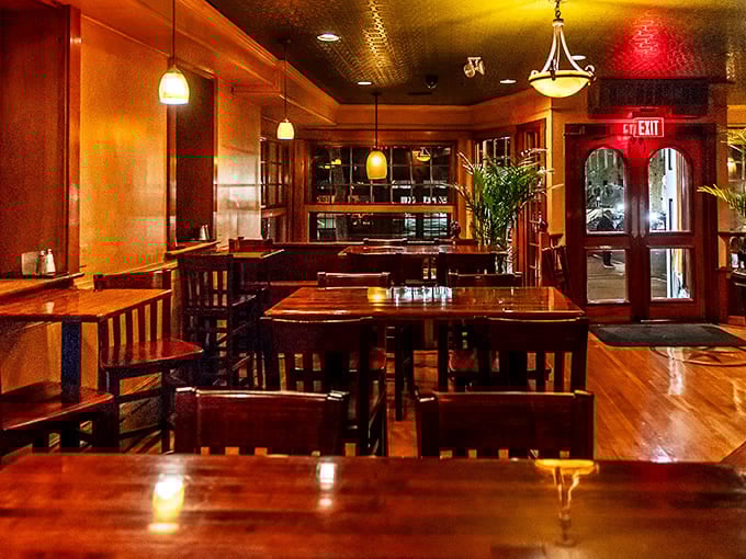 Evening ambiance that whispers "stay awhile"&mdash;warm lighting and polished wood create the perfect setting for that second glass of wine you definitely deserve.