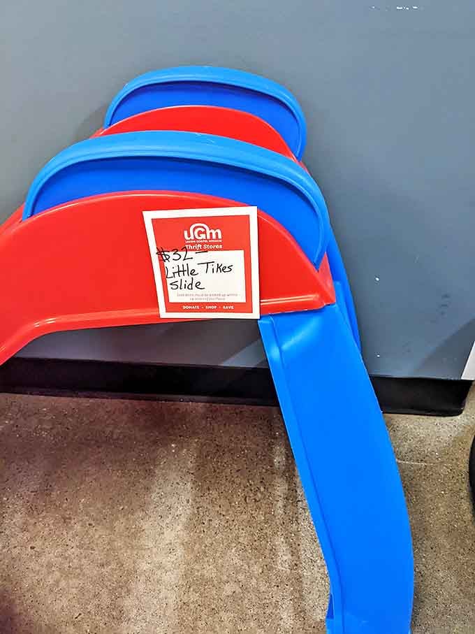 A Little Tikes slide awaits its next backyard adventure&mdash;proof that even childhood joy comes at a discount when you shop secondhand.