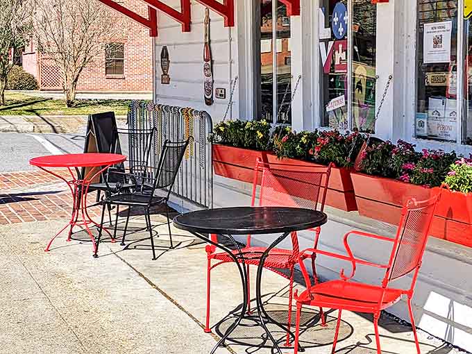The outdoor seating area&mdash;where the red chairs pop against the white building&mdash;offers the perfect perch for people-watching between bites of po'