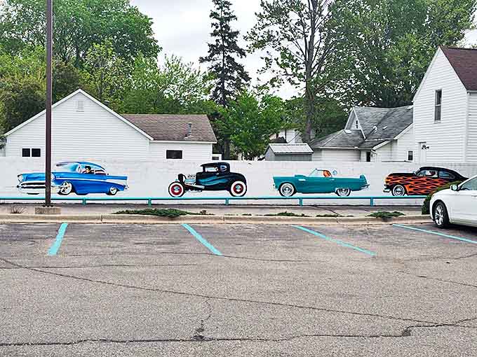 The parking lot wall mural celebrates America's love affair with the automobile&mdash;fitting for a place that perfected the drive-in dining experience.
