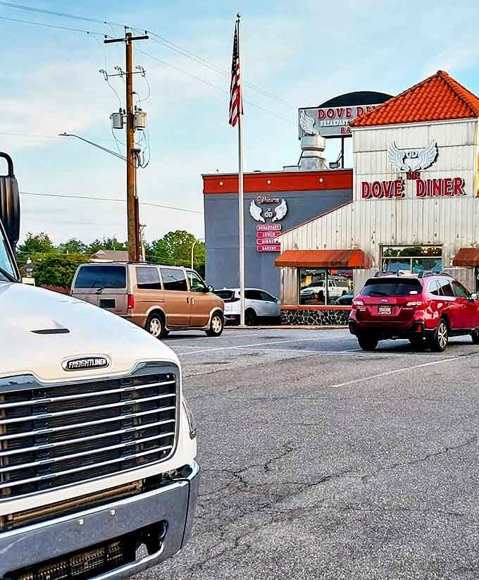 The American flag stands tall outside The Dove Diner. Cars in the parking lot tell the story &ndash; this place draws everyone from work trucks to family sedans.