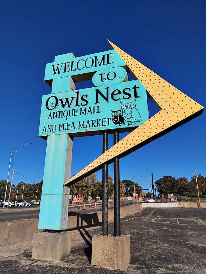 A retro sign that beckons with mid-century charm, pointing the way to Topeka's own cabinet of curiosities and vintage wonders.